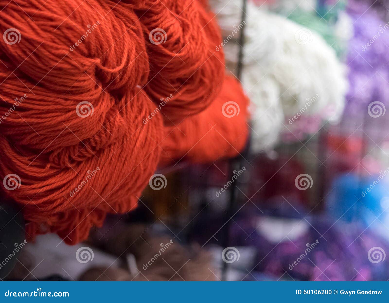 Red yarn in retail display stock photo. Image of market - 60106200