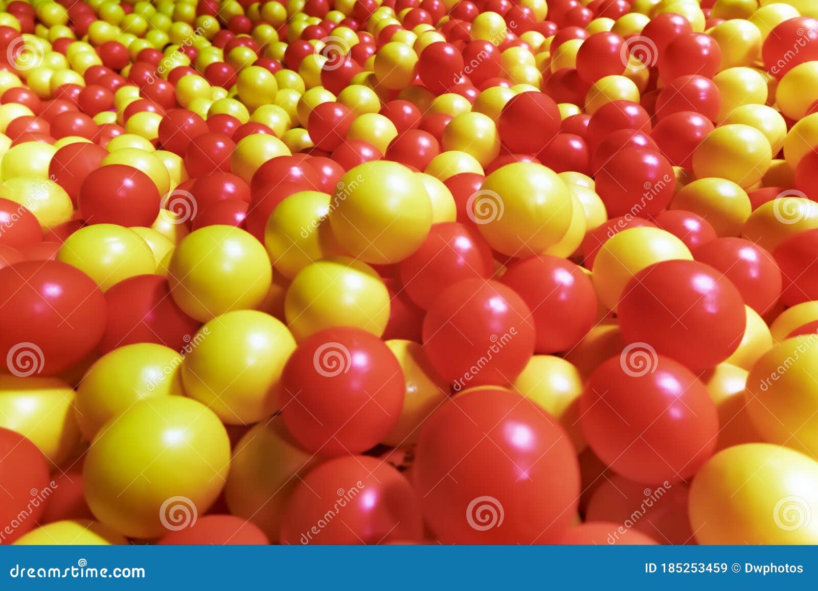 Red and Yellow Balls in the Pit Stock Image - Image of texture ...
