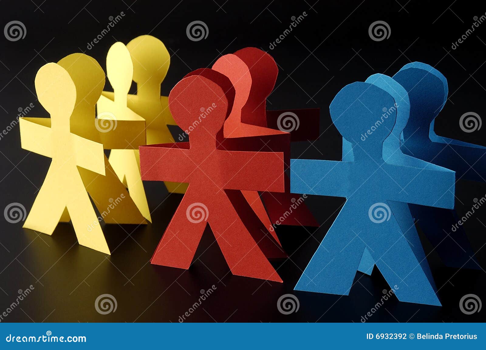 Red Yellow and Blue Paper Men Stock Photo - Image of chain, peaceful ...