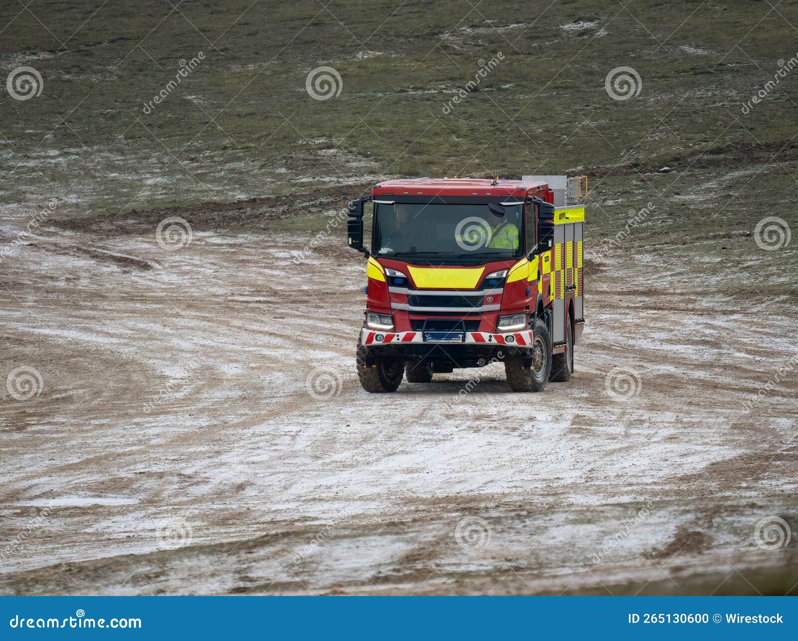 Red and Yellow Fire Engine Driven Off Ro Stock Photo - Image of ...