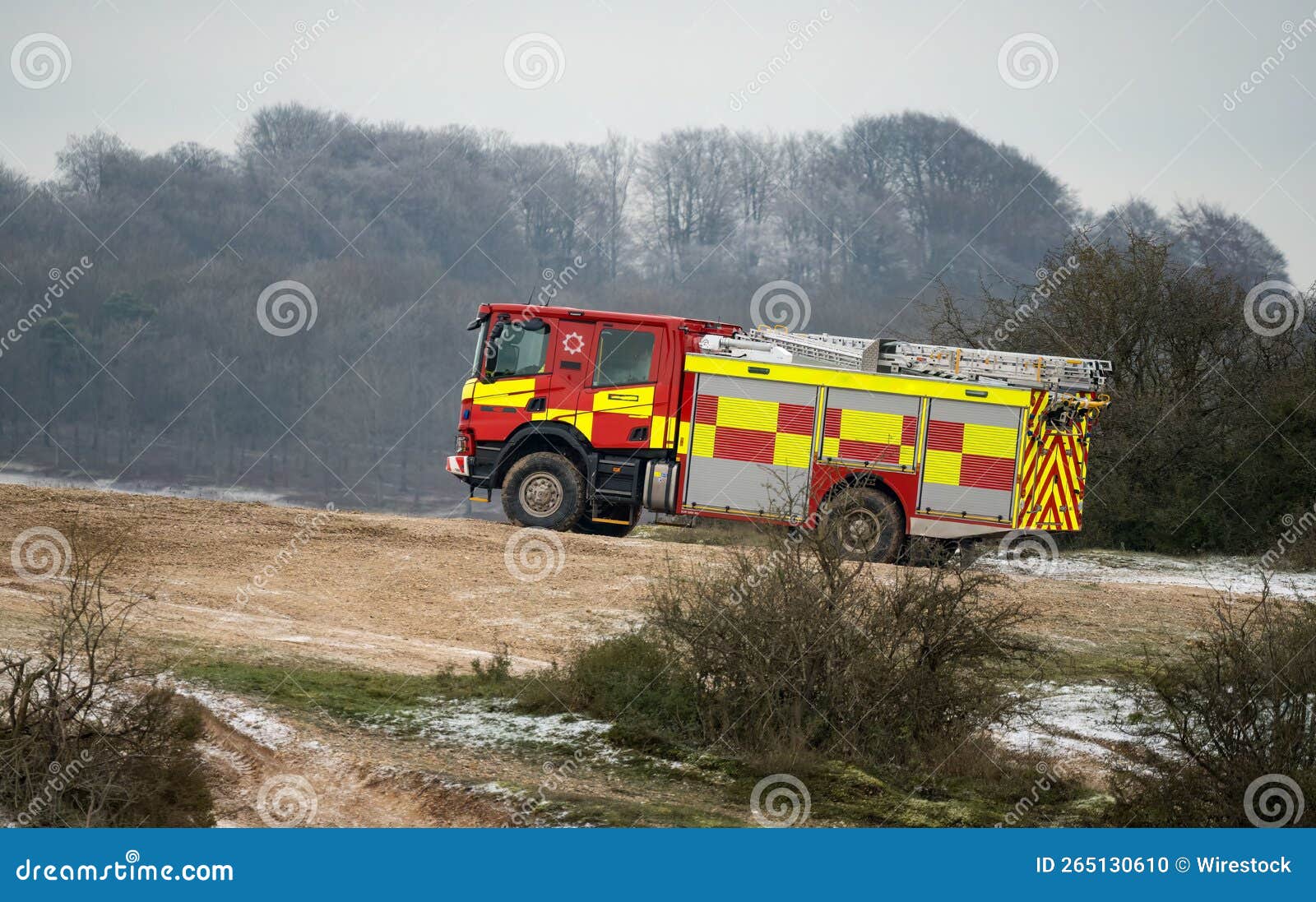 Red and Yellow Fire Engine Driven Off Ro Stock Photo - Image of machine ...