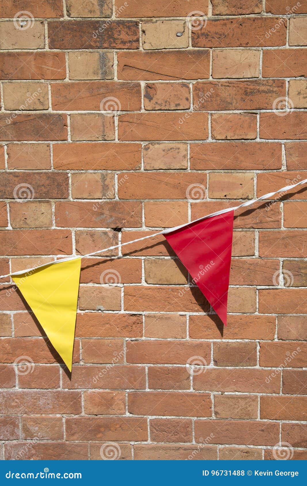 Red and Yellow Flags stock photo. Image of wall, triangle - 96731488