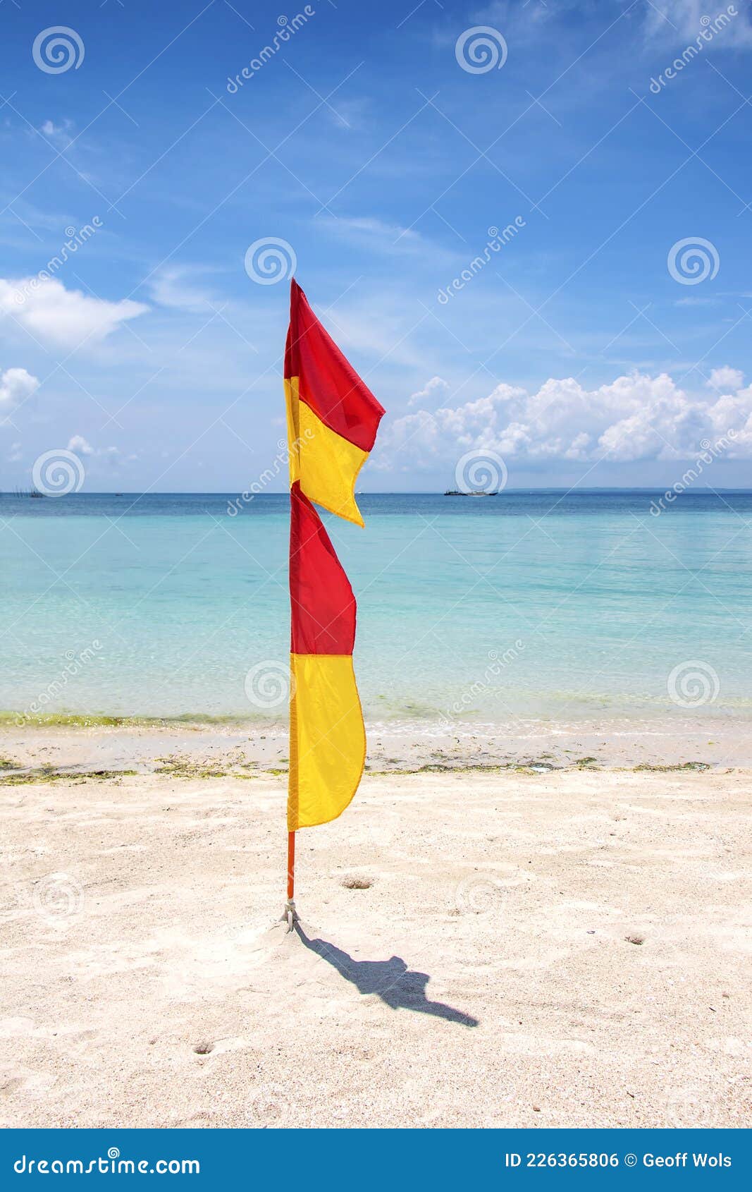 Red and Yellow Lifeguard Flags at Beach on Bantayan Island in the ...