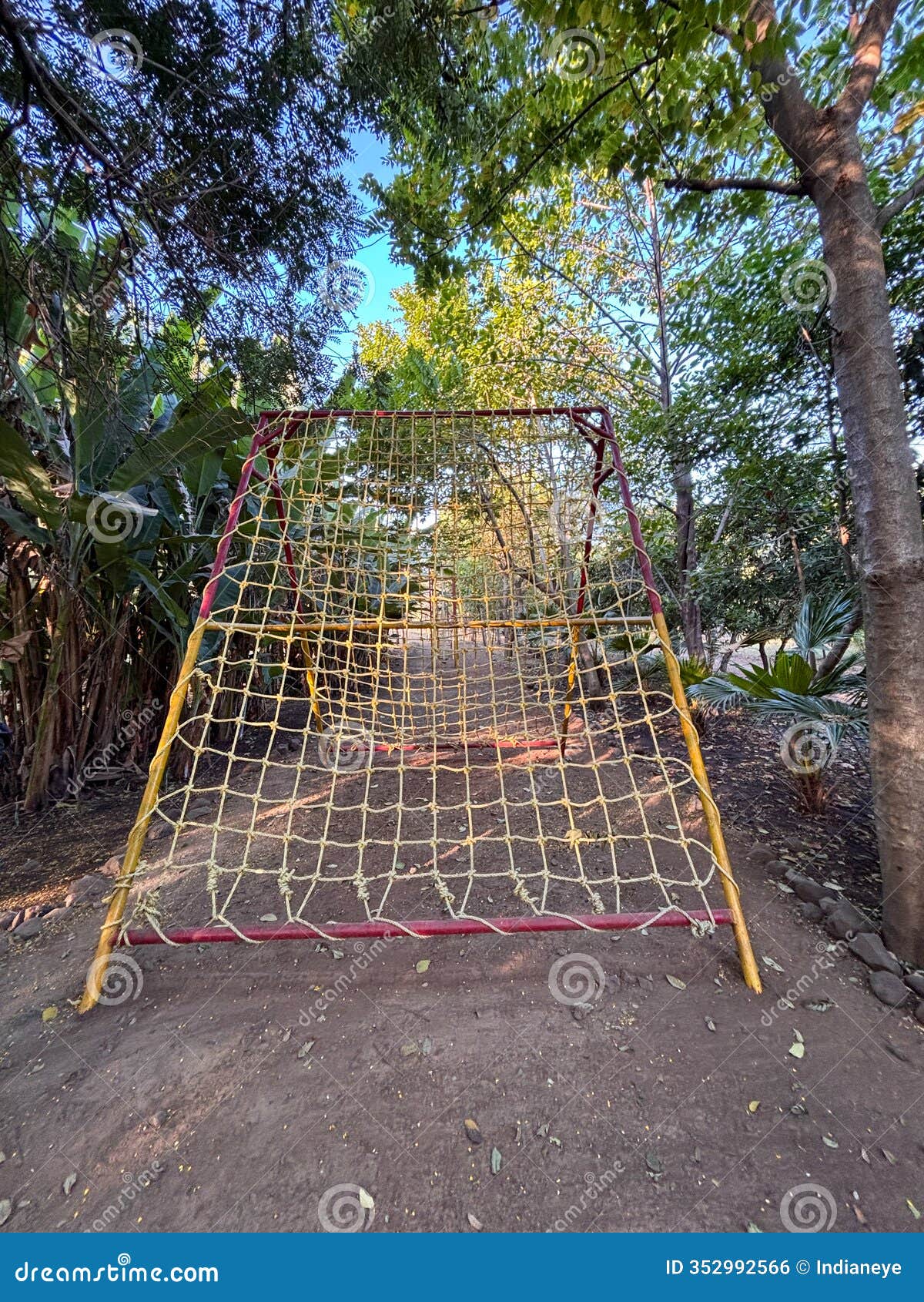 A Red and Yellow Obstacle Course with a Net Stock Photo - Image of ...