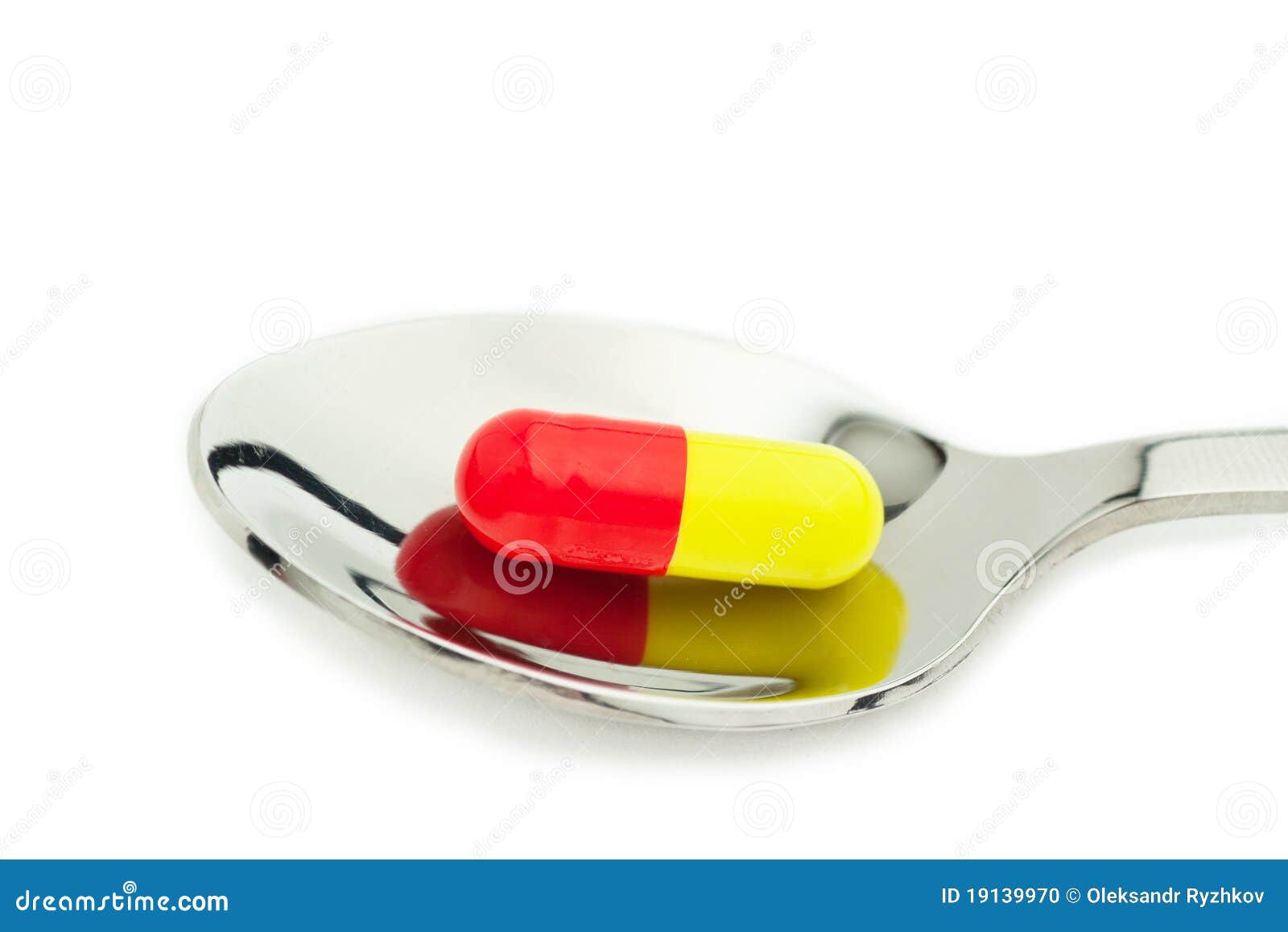 Red and Yellow Tablet in Spoon Stock Photo - Image of medical, medicine ...