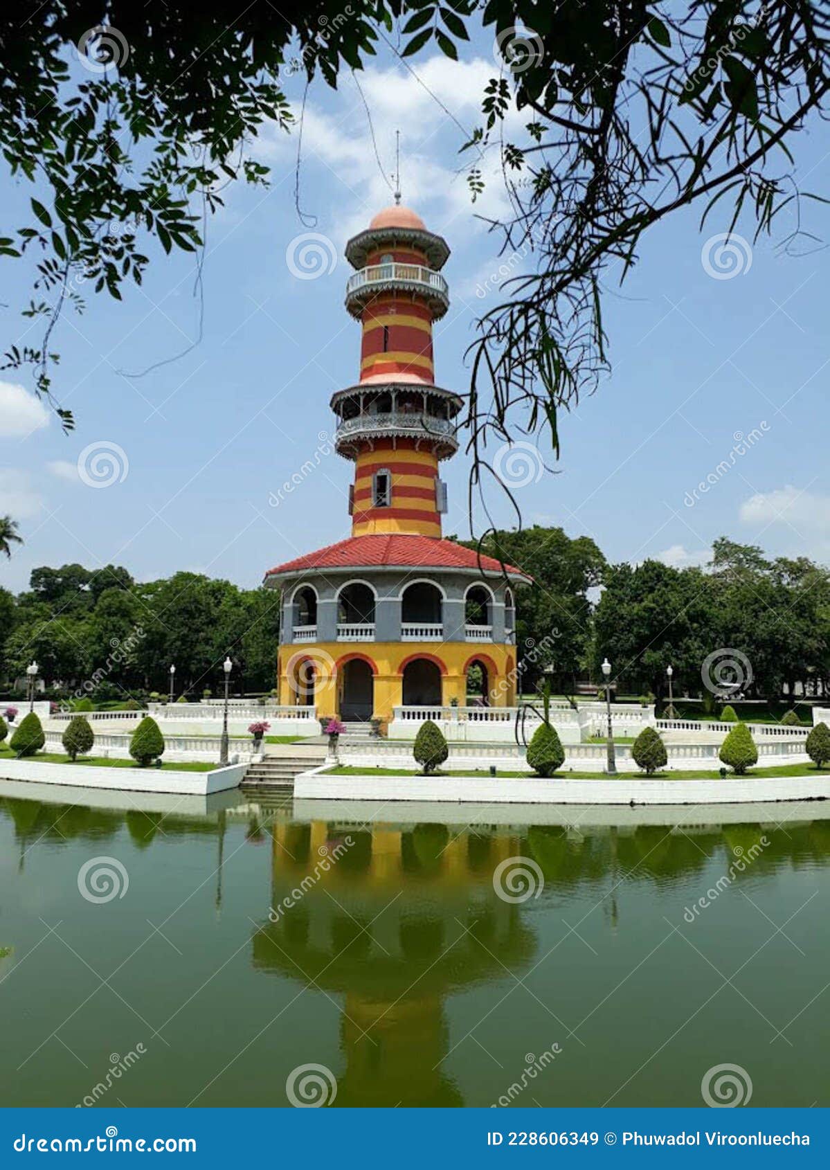 Red yellow tower stock image. Image of reflection, park - 228606349
