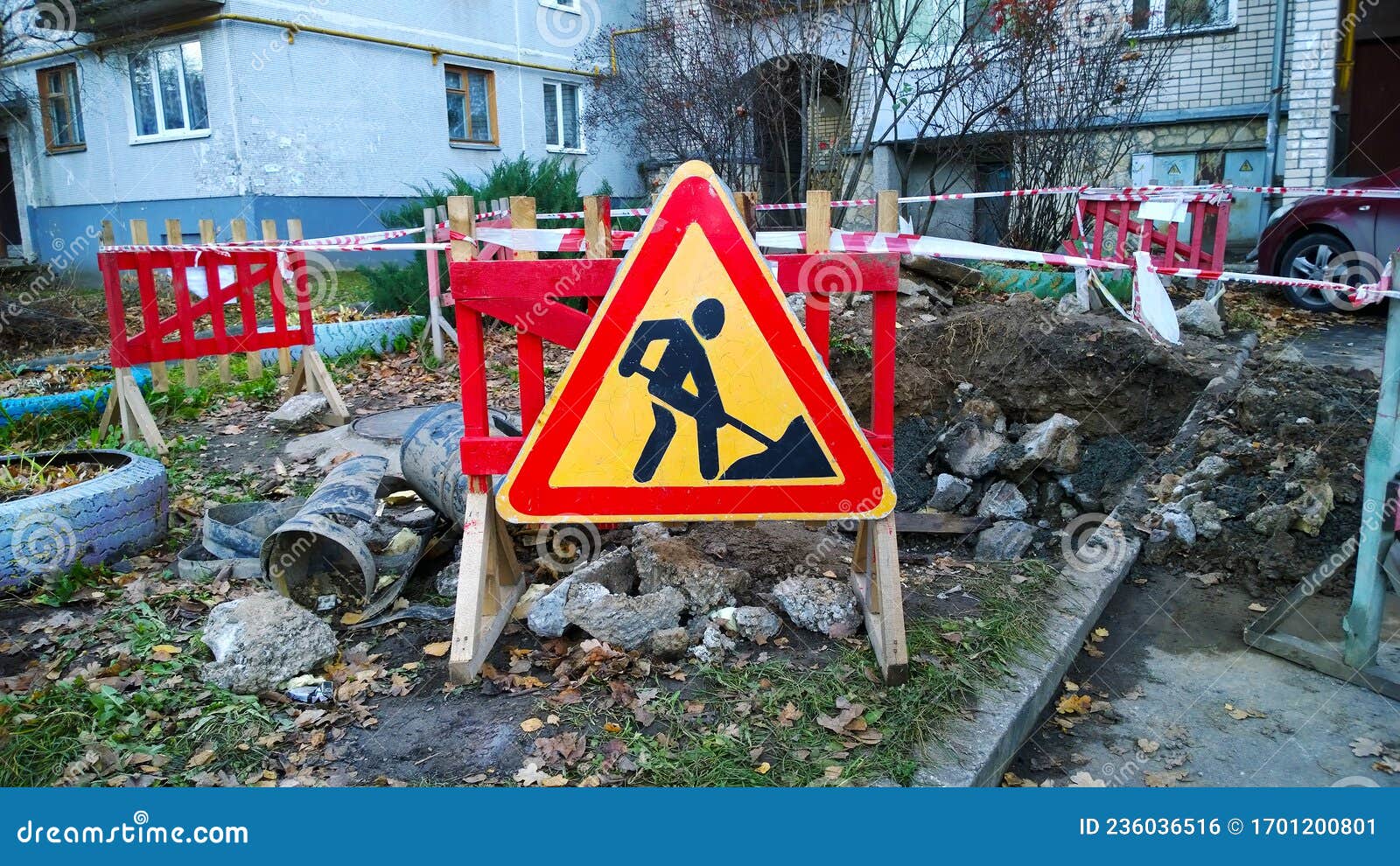 Red and Yellow Triangular Road Warning Sign Denoting Construction Work ...