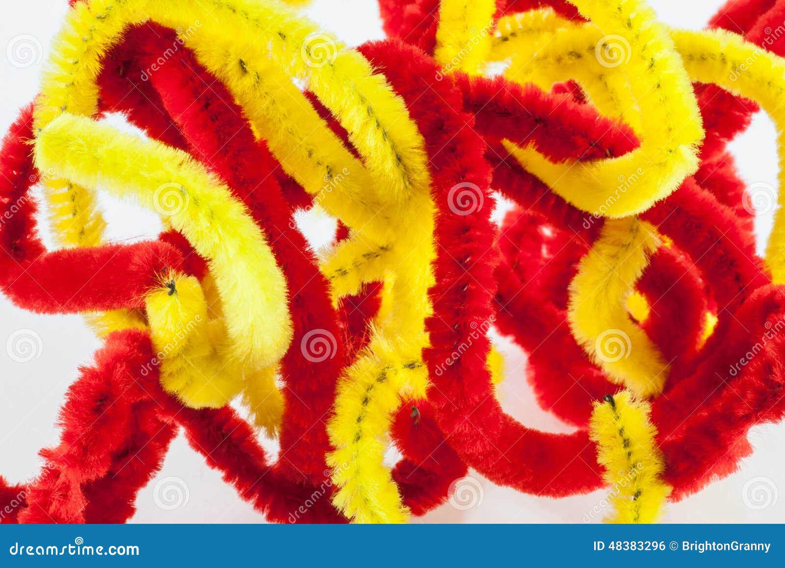 Red and Yellow Twisted Pipe Cleaners Stock Photo - Image of background ...