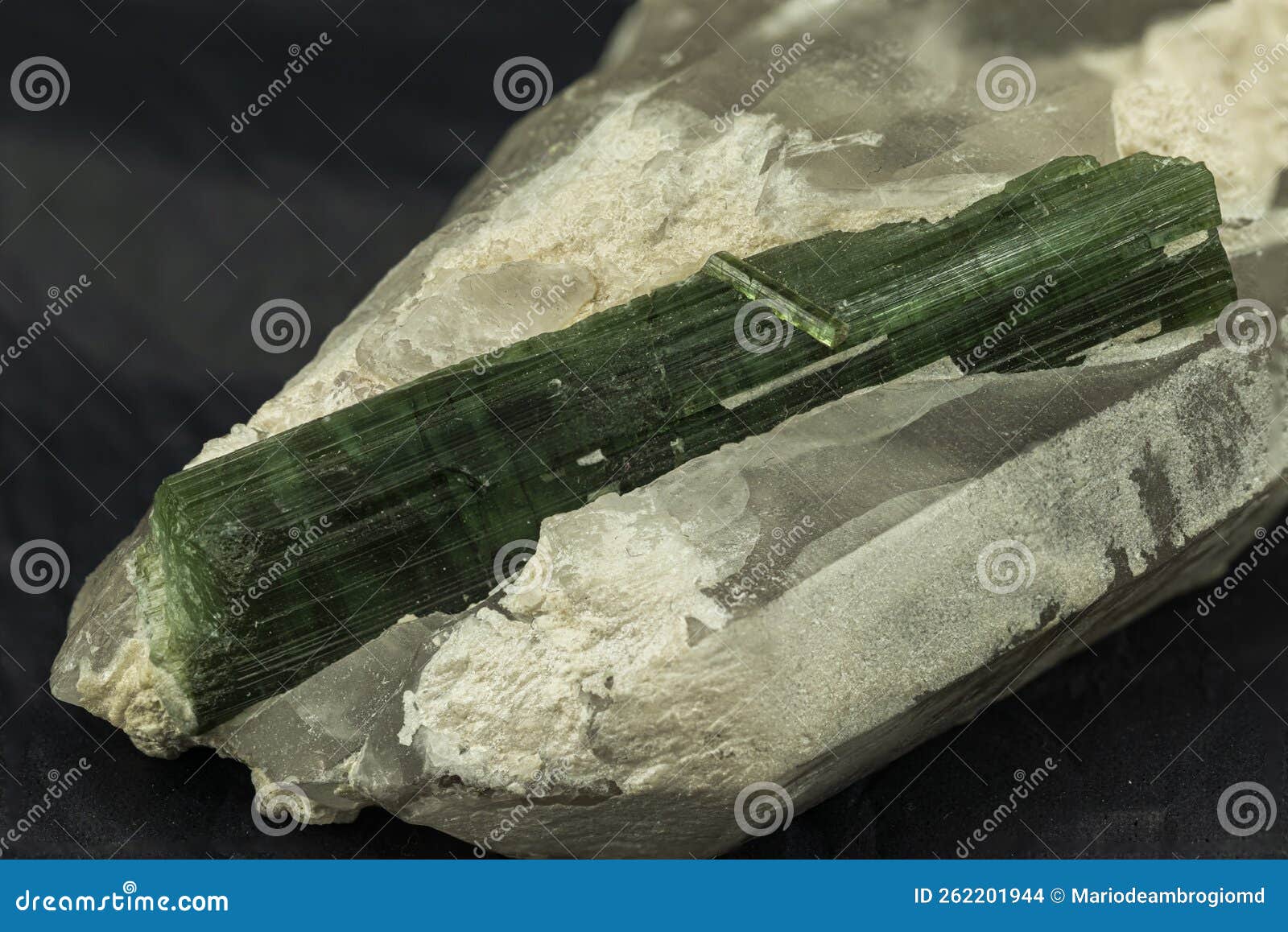 Reddish Tourmaline Stone on Matrix Against Black Background Stock Photo ...