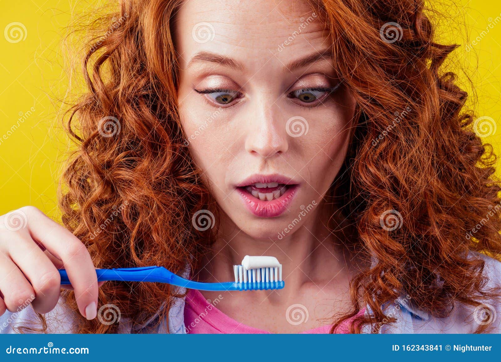 Redhaired Ginger Woman Brushing Teeth with Toothpaste Eco Paste on ...