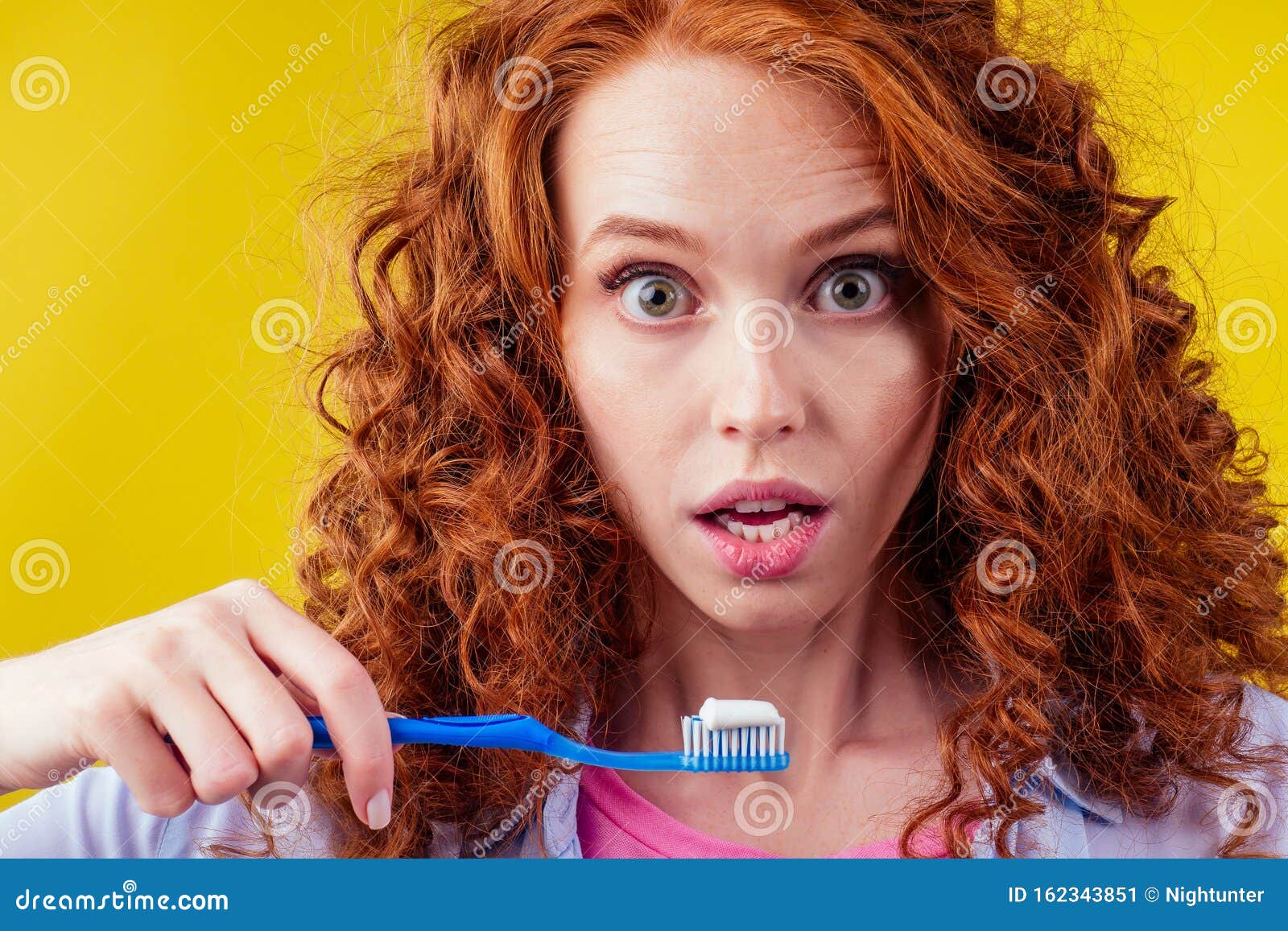 Redhaired Ginger Woman Brushing Teeth with Toothpaste Eco Paste on ...