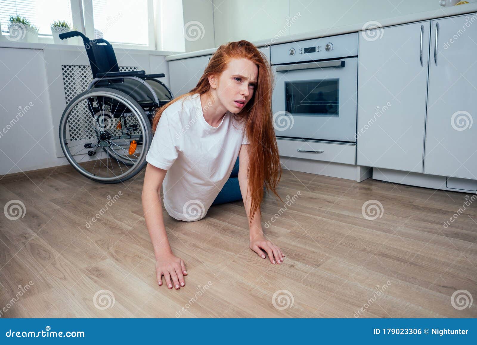 Redhaired Ginger Woman Falling Down and Crawling for Help in Kitchen ...