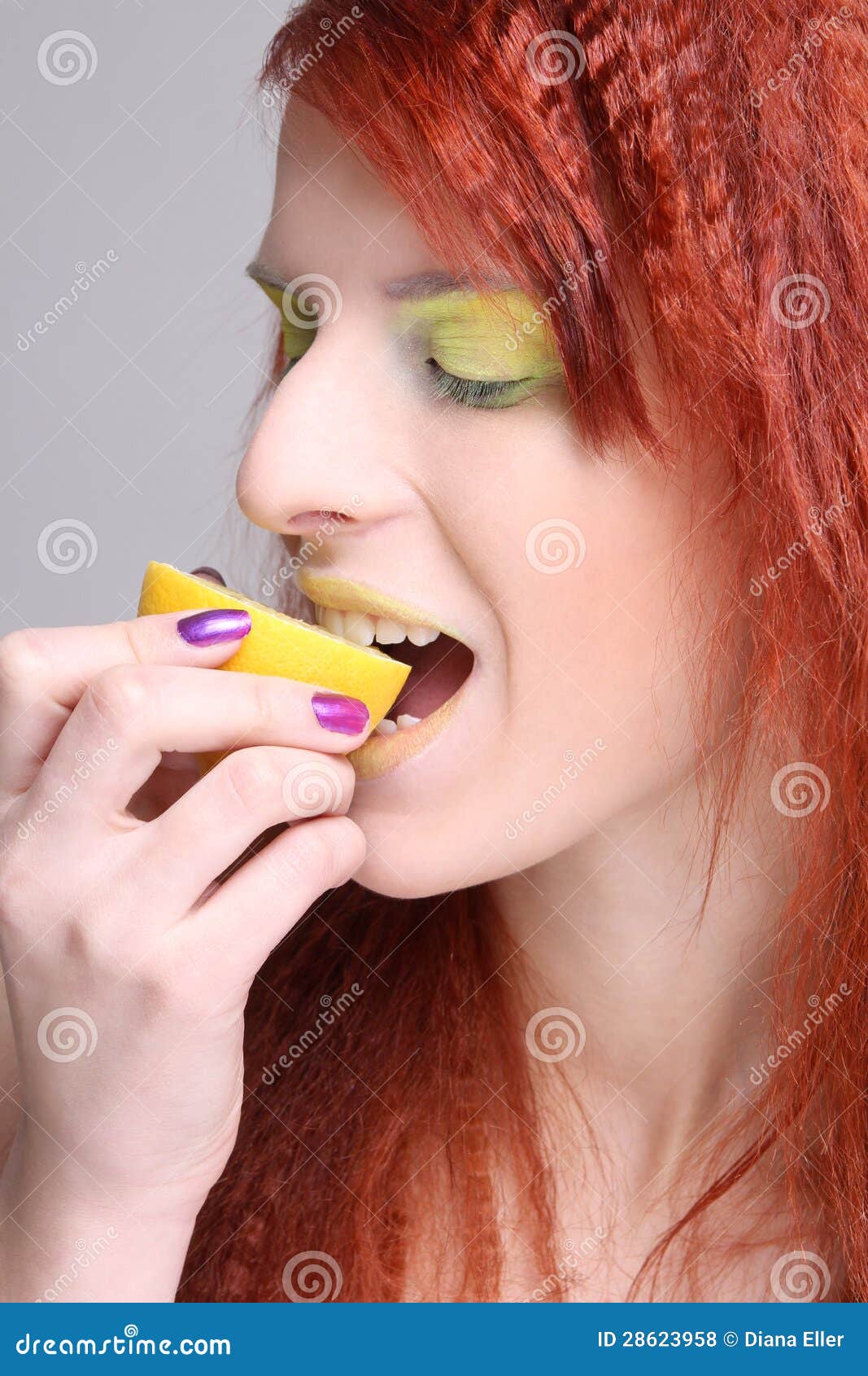 Redhaired Girl Eating the Lemon Stock Photo - Image of hair, girl: 28623958