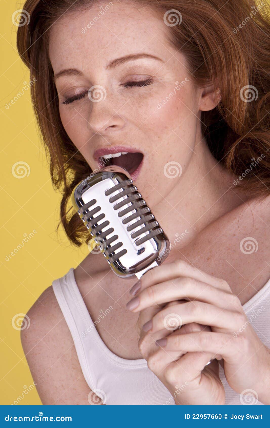 Redhead female singer. stock photo. Image of musician - 22957660