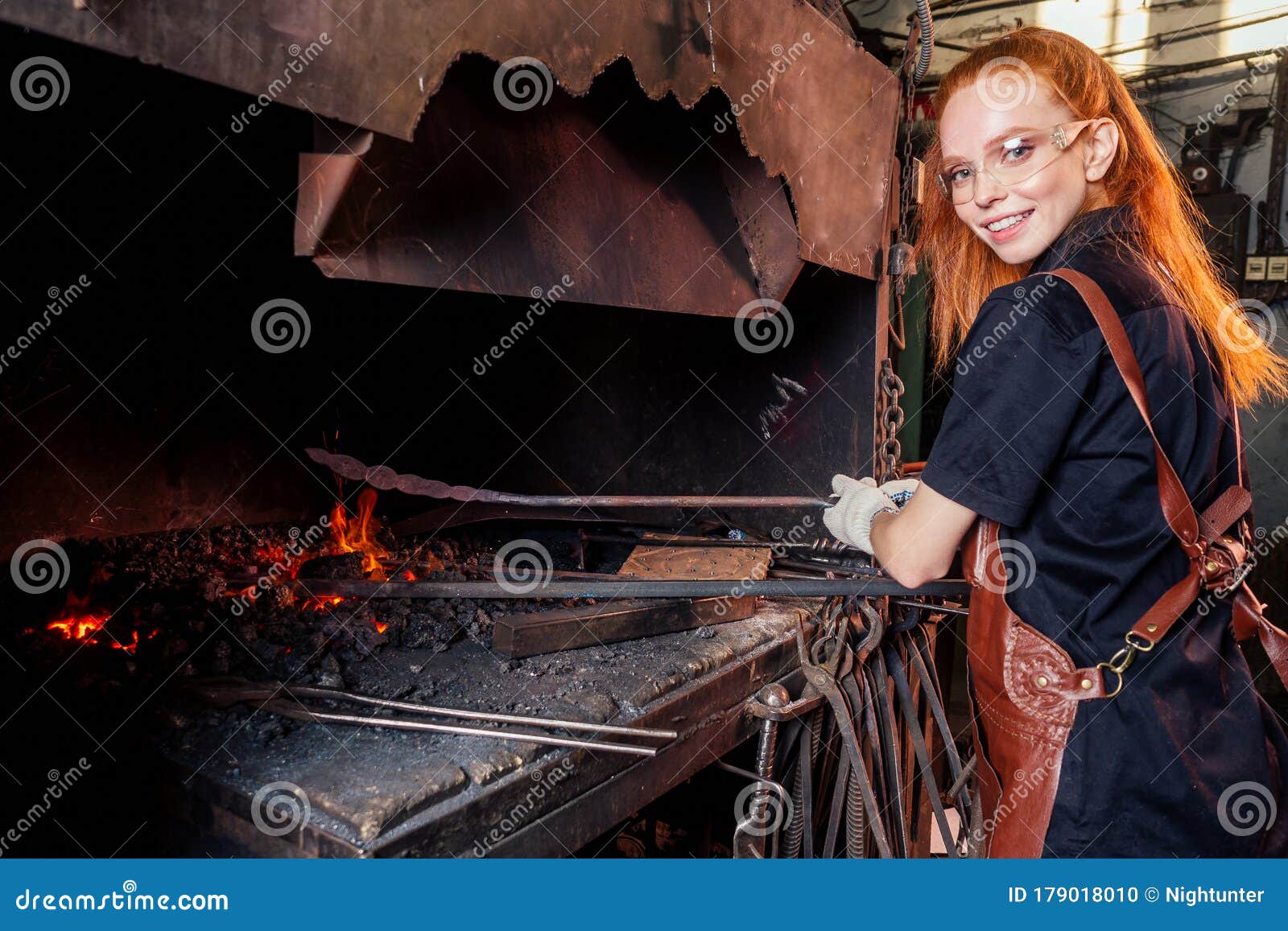Redhead Ginger Woman Blacksmith Portrait in Workshop Stock Photo ...