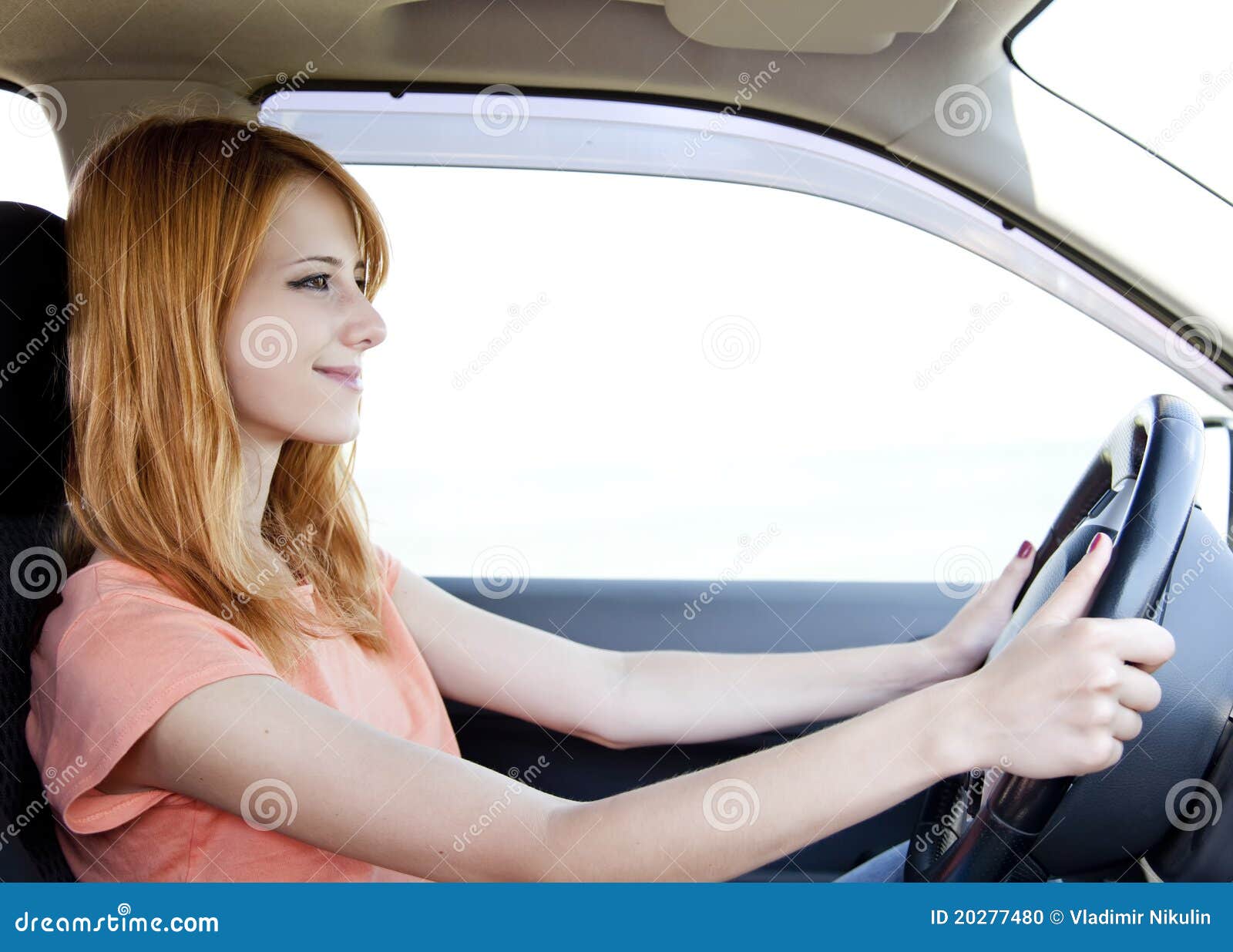 Redhead girl in the car. stock photo. Image of head, smile - 20277480