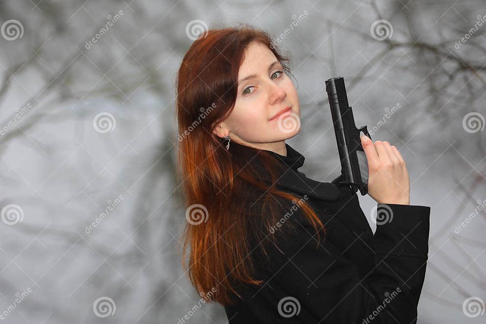Redhead with a gun stock image. Image of portrait, slavic - 11950041