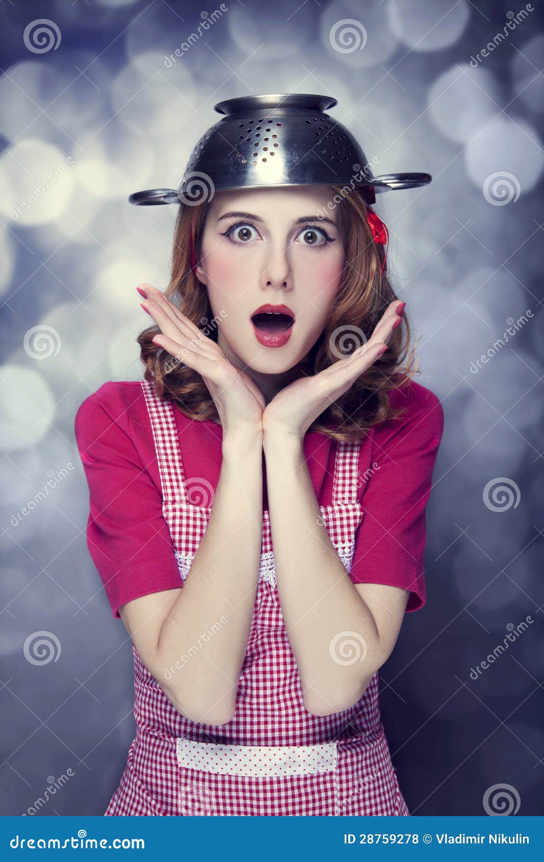 Redhead Housewife with Colander Over Head Stock Photo - Image of meal ...