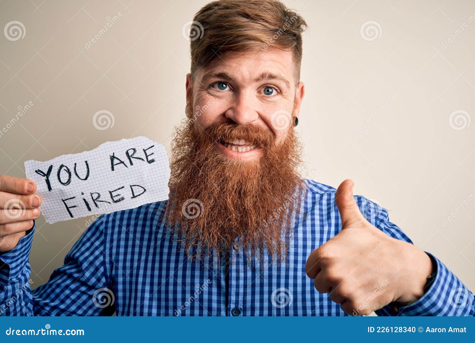 Redhead Irish Man With Beard Doing Housework Laundry Over Yellow Background With Angry Face