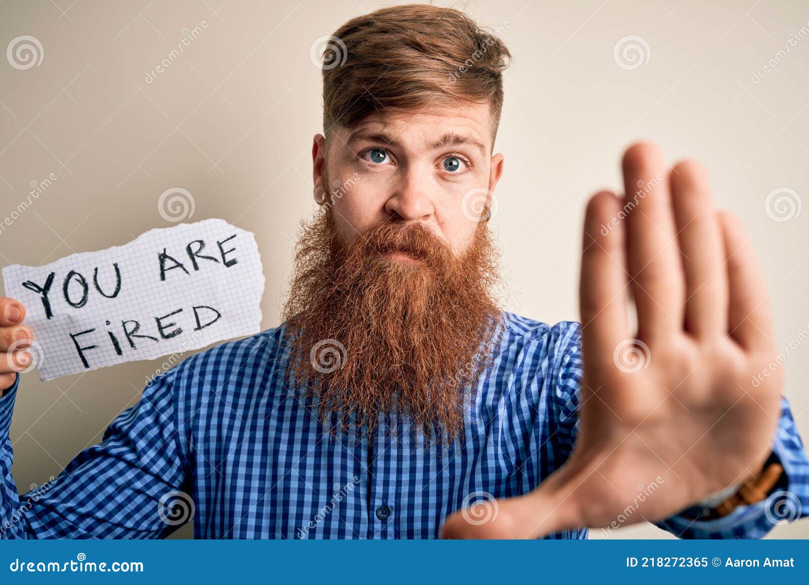 Redhead Irish Man With Beard Doing Housework Laundry Over Yellow Background With Angry Face