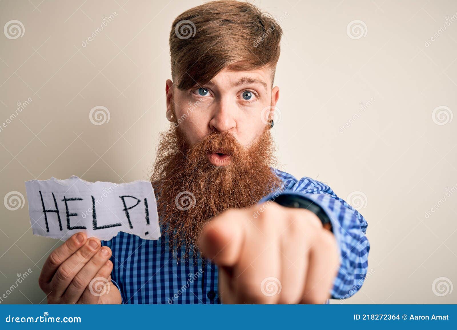 Redhead Irish Man With Beard Doing Housework Laundry Over Yellow Background With Angry Face