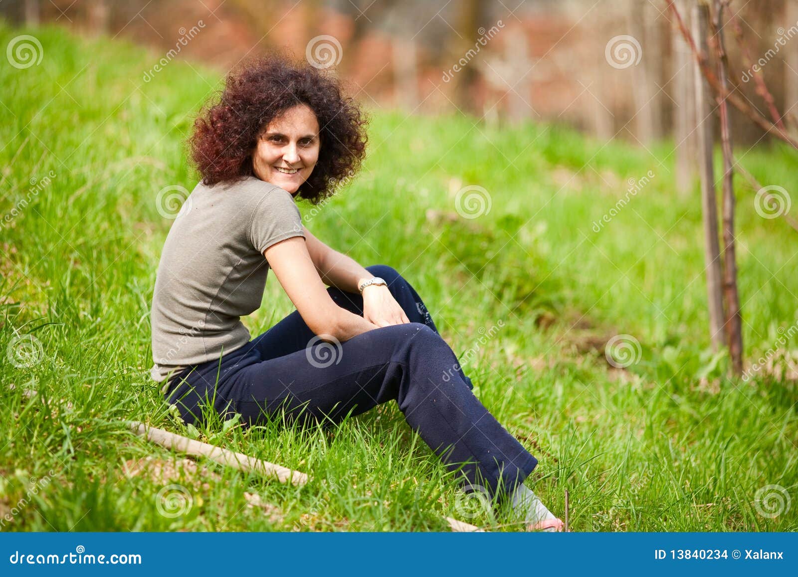 Redhead Lady Sitting in Grass Stock Photo - Image of outside, gorgeous ...