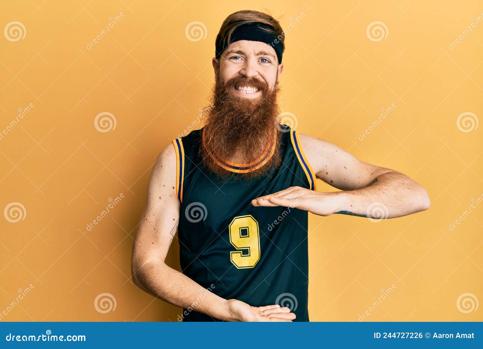 Redhead Man With Long Beard Wearing Basketball Uniform Gesturing With