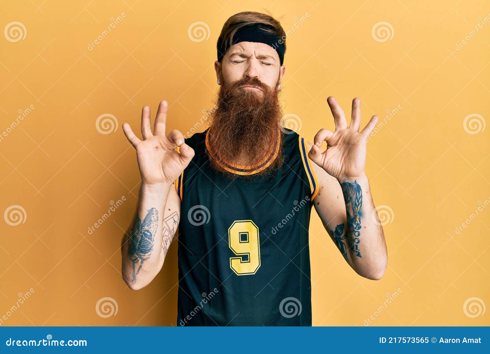 Redhead Man With Long Beard Wearing Basketball Uniform Relax And