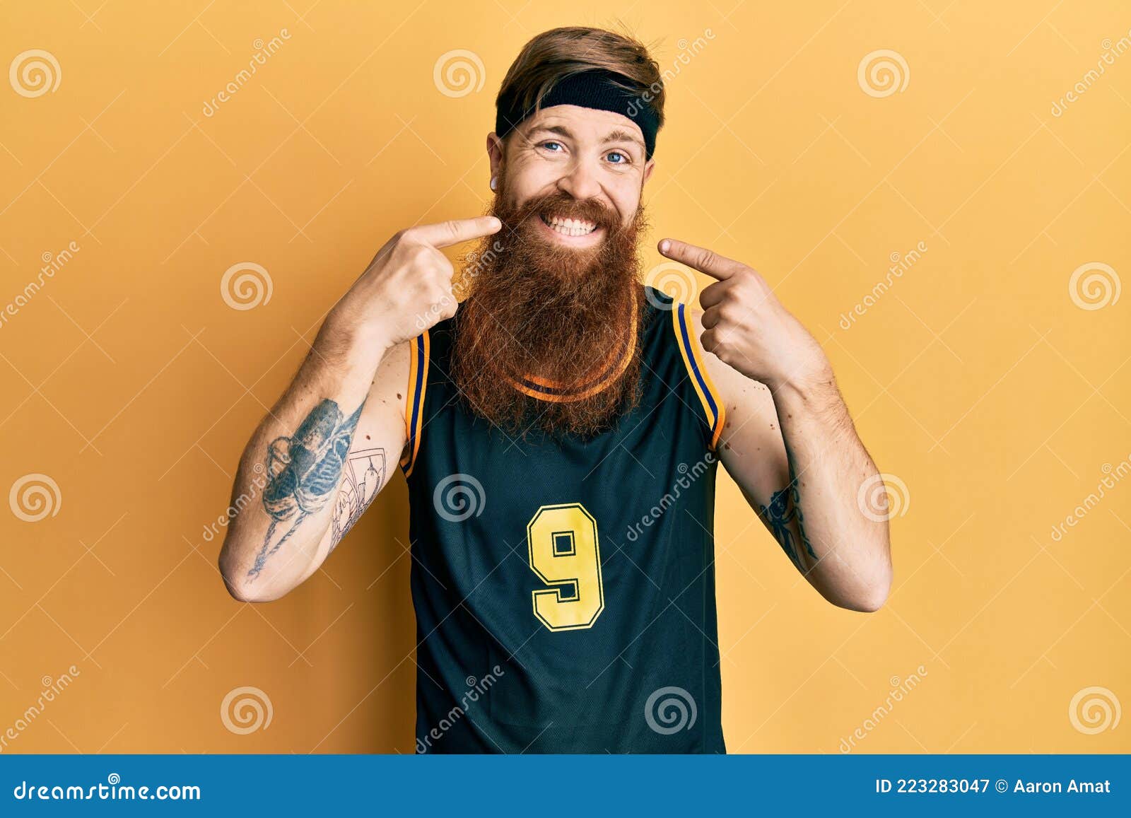 Redhead Man With Long Beard Wearing Basketball Uniform Smiling Cheerful