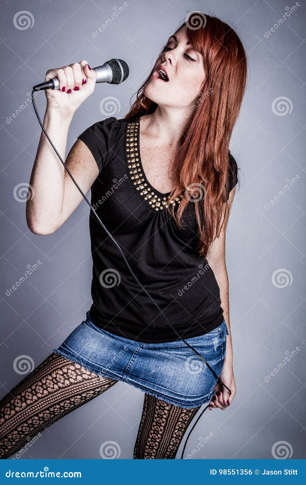 Redhead Singing Girl stock photo. Image of performer - 98551356