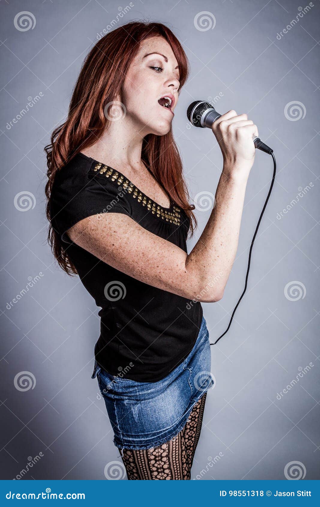 Redhead Singing Woman stock photo. Image of music, adult - 98551318