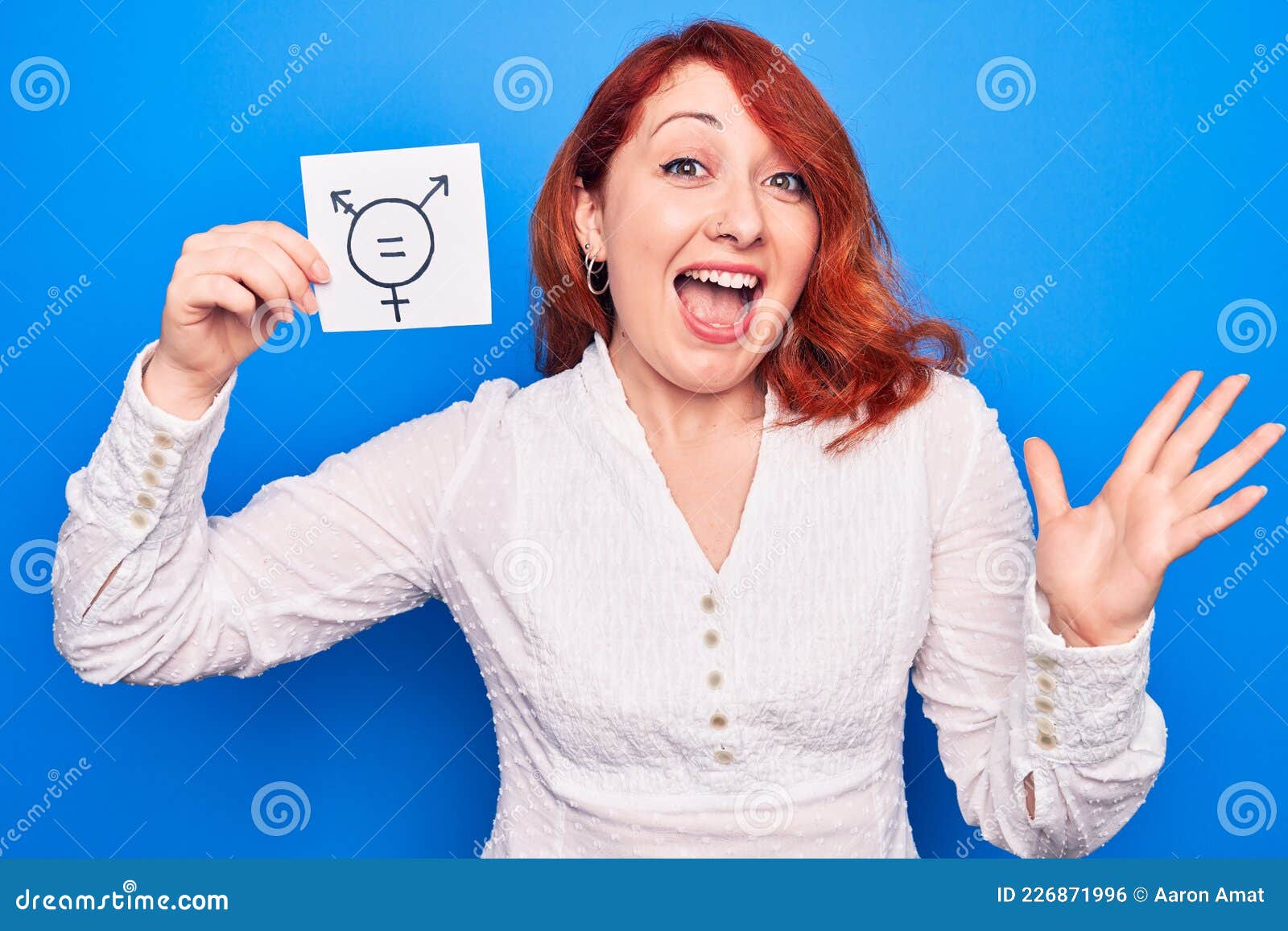 Redhead Woman Asking For Sex Discrimination Holding Paper With