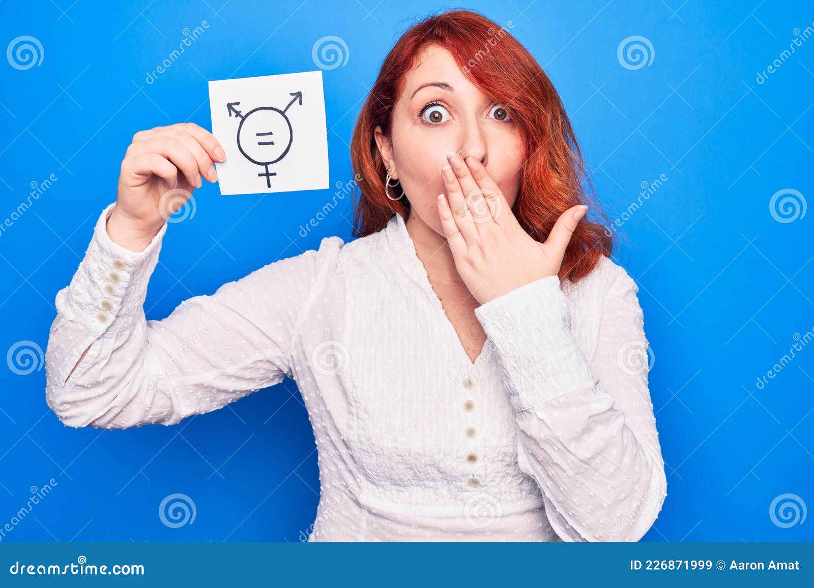 Redhead Woman Asking For Sex Discrimination Holding Paper With