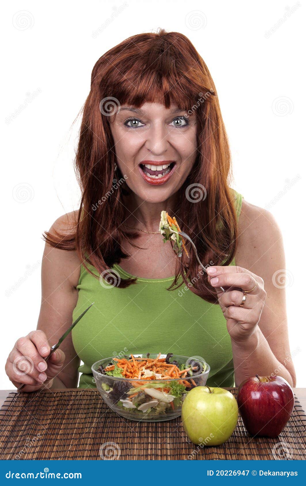 Redhead woman eating stock image. Image of model, look - 20226947