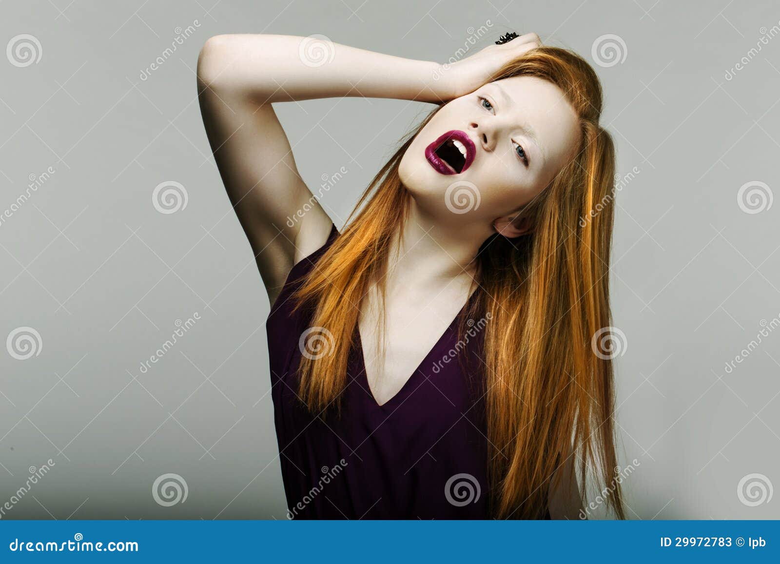 Shock Neurotic Unhappy Red Head Woman Pulling Her Hair In Frustration