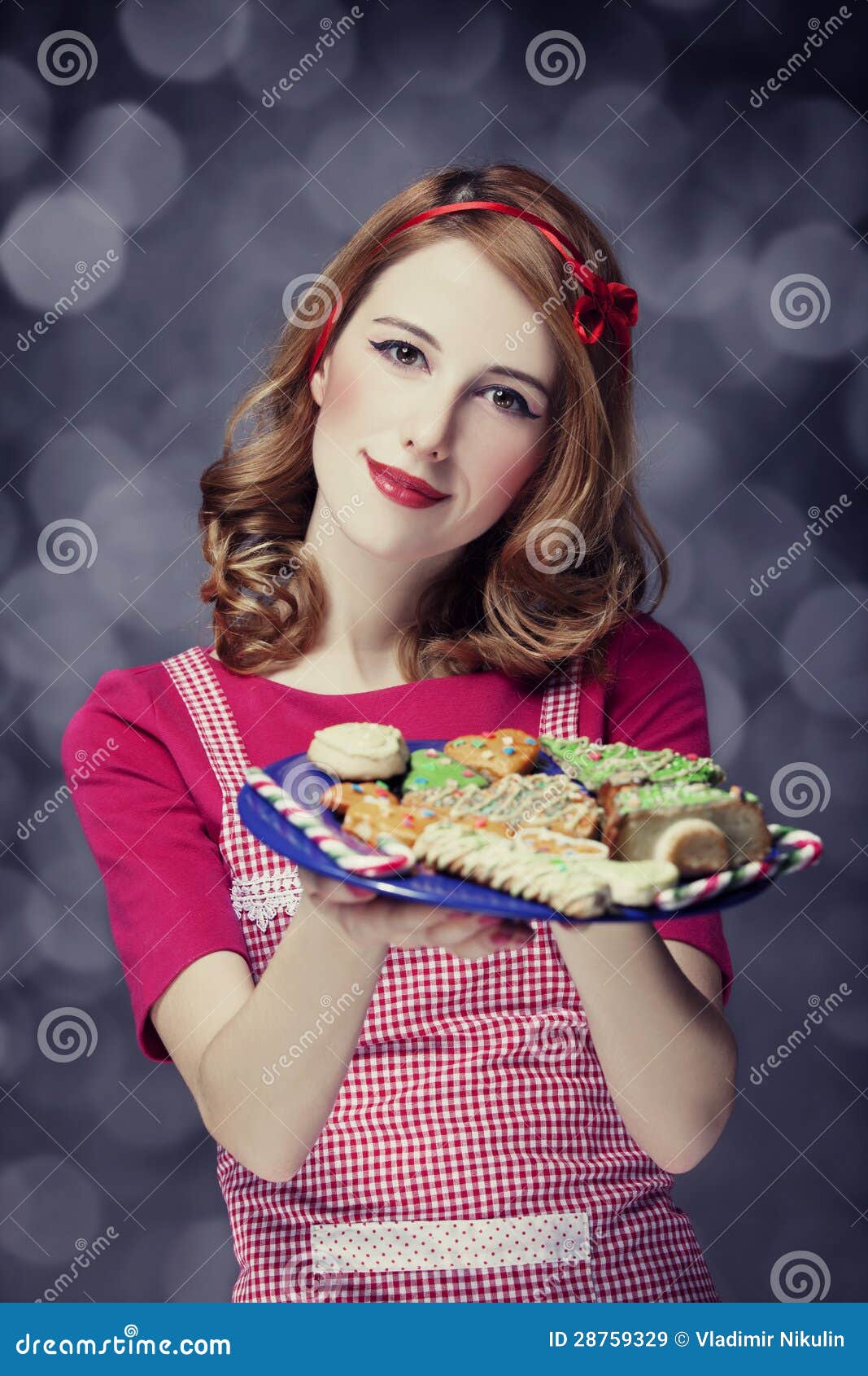 Redhead women with cookies stock image. Image of cook - 28759329