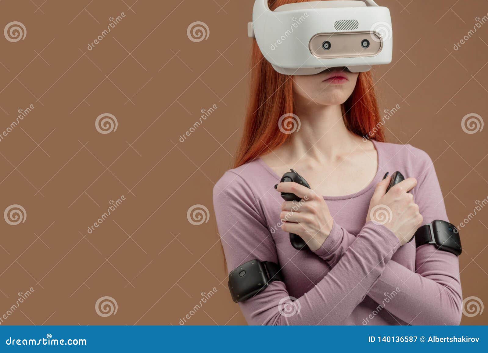 Happy Young Red-haired Woman Using a Virtual Reality Headset Stock ...