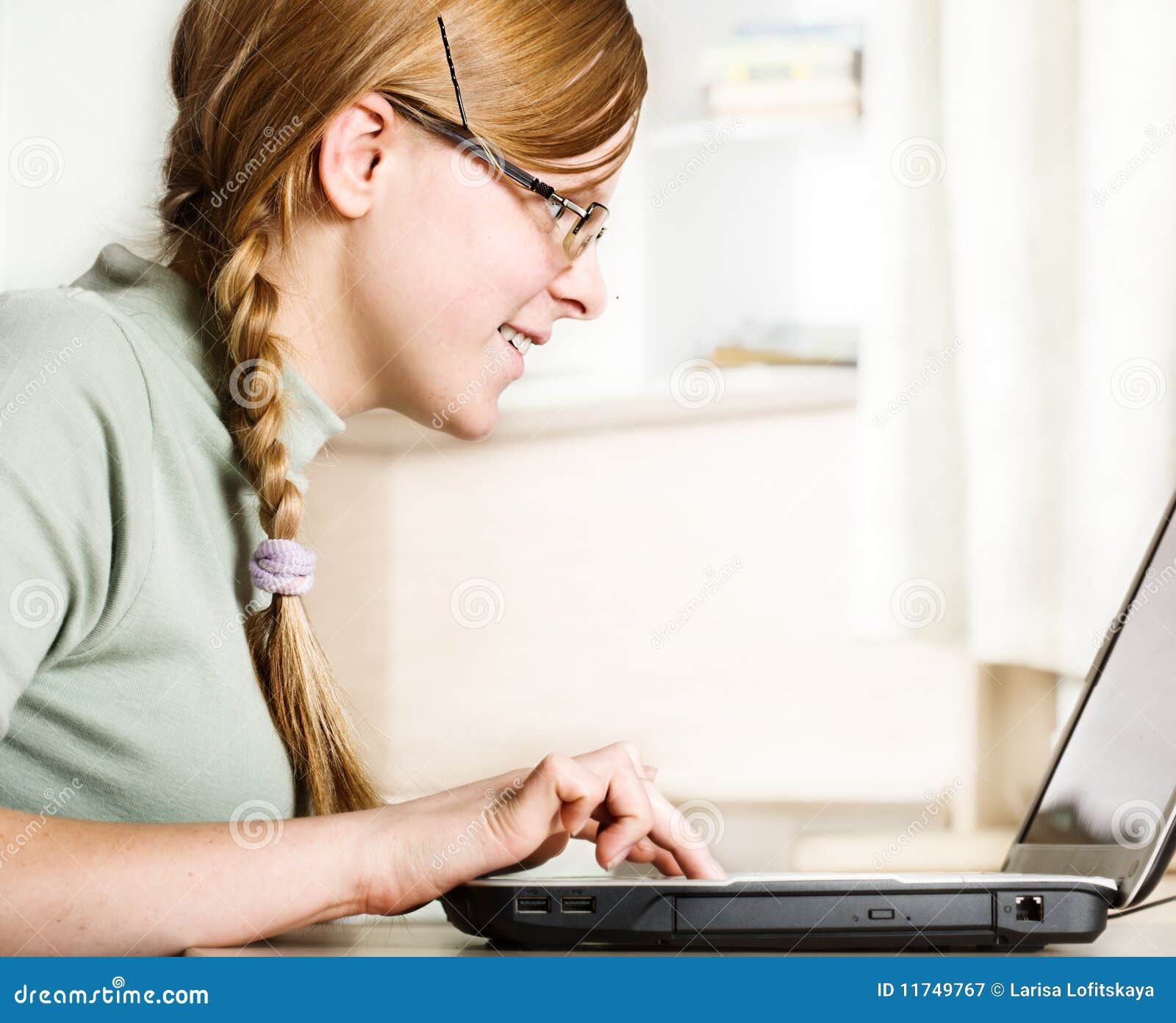 Redheaded Girl Uses Home Computer Stock Image - Image of happy, looking ...