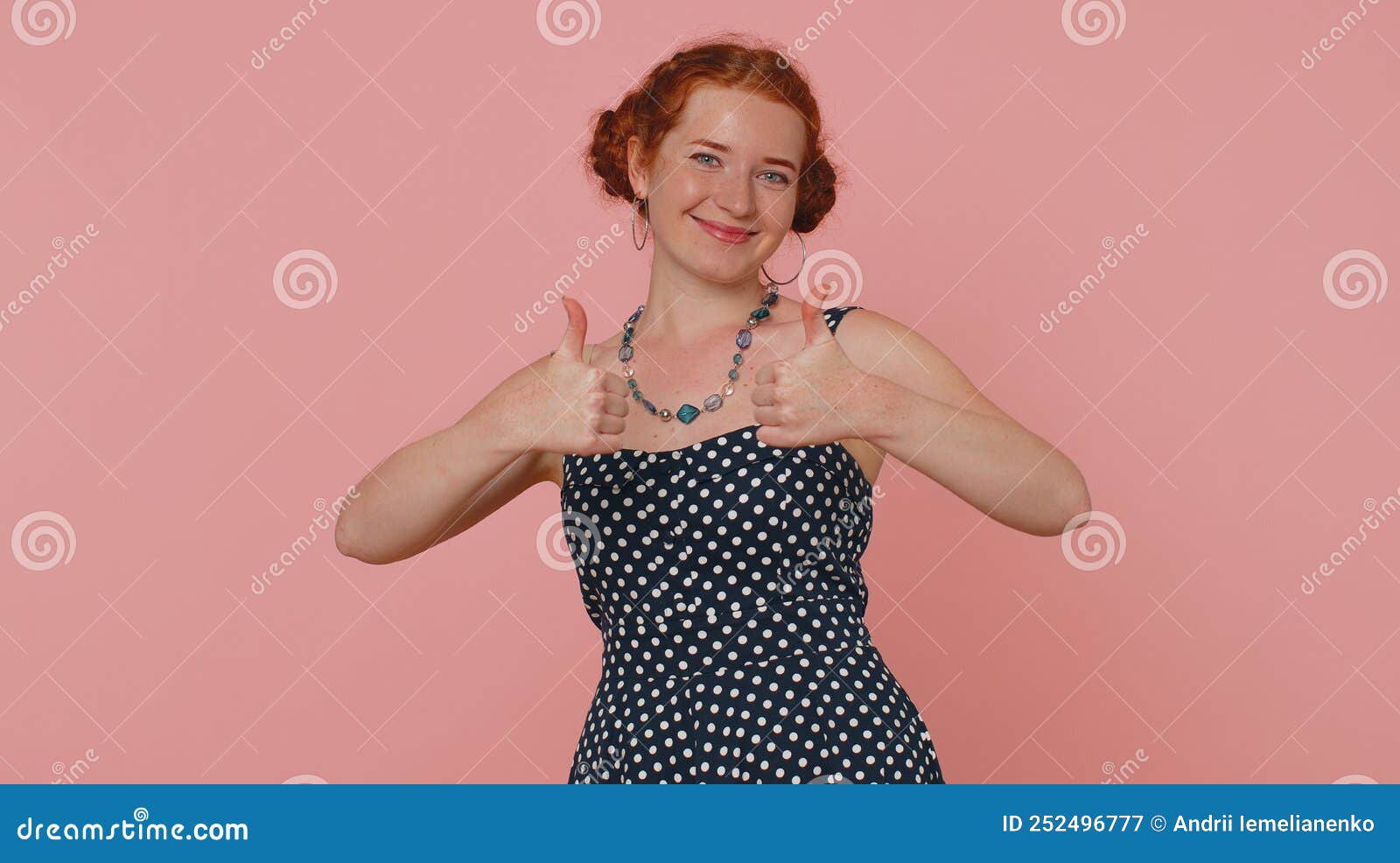 Redheaded Woman Raises Thumbs Up Agrees Or Gives Positive Reply