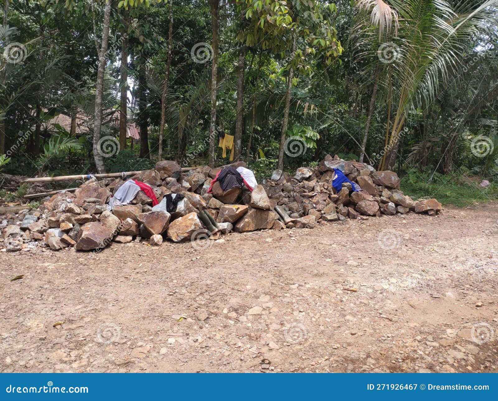 Reduce the Water Content in Clothes by Drying on a Pile of Stones Stock ...