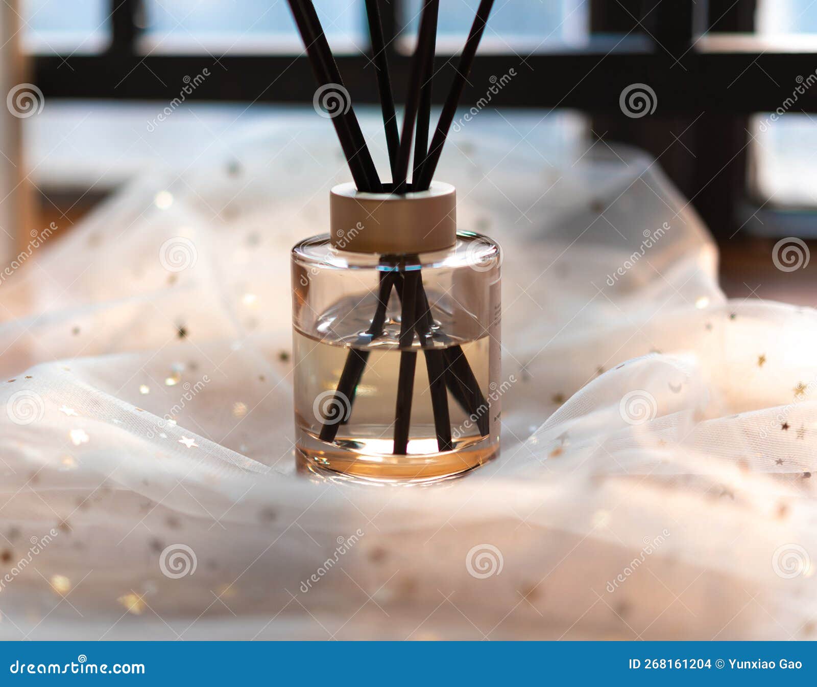 Reed Diffuser in Glass Bottle Placed on Beautiful Gauze Decorated with ...