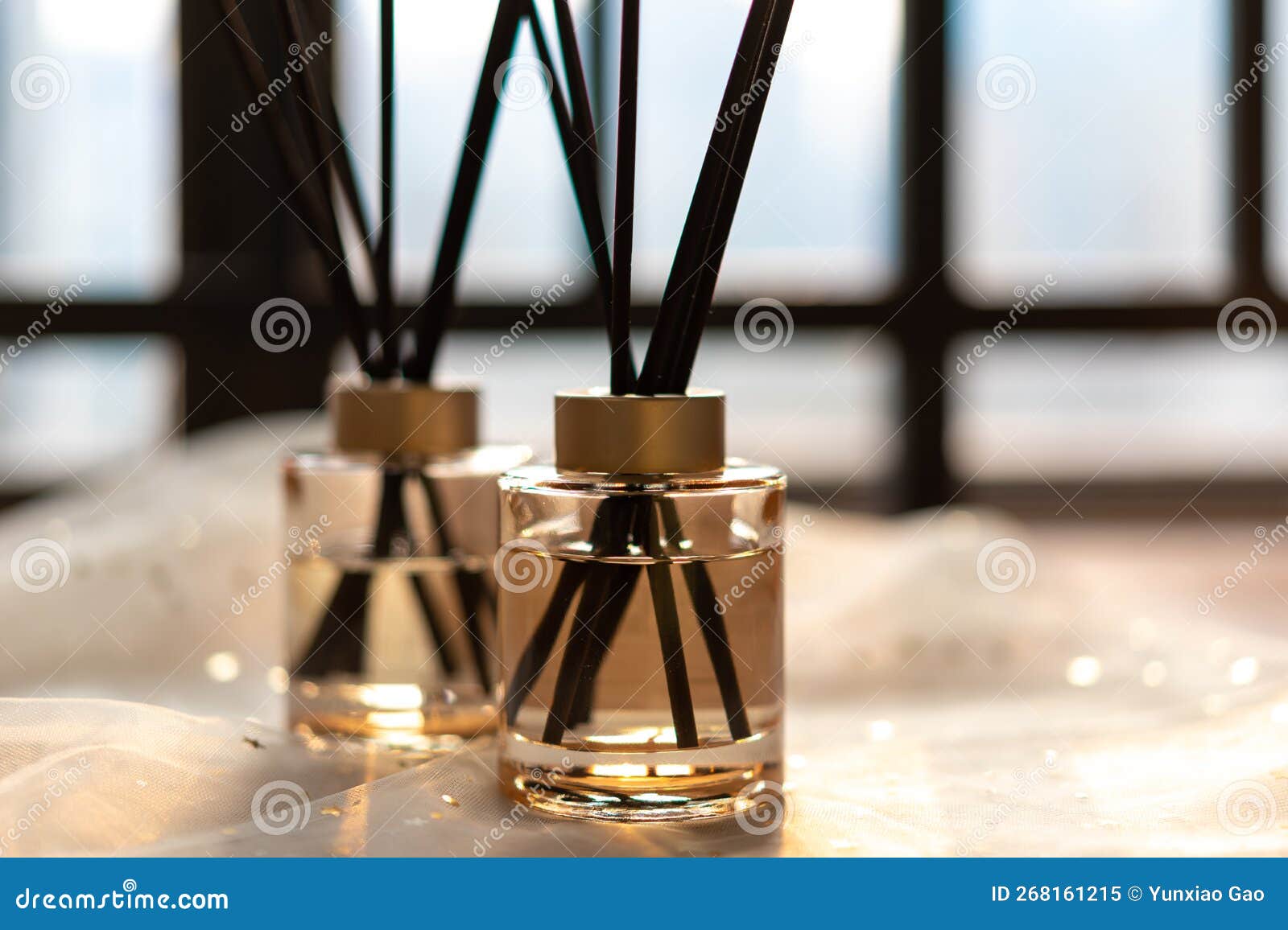 Reed Diffuser in Glass Bottle Placed on Beautiful Gauze Decorated with ...