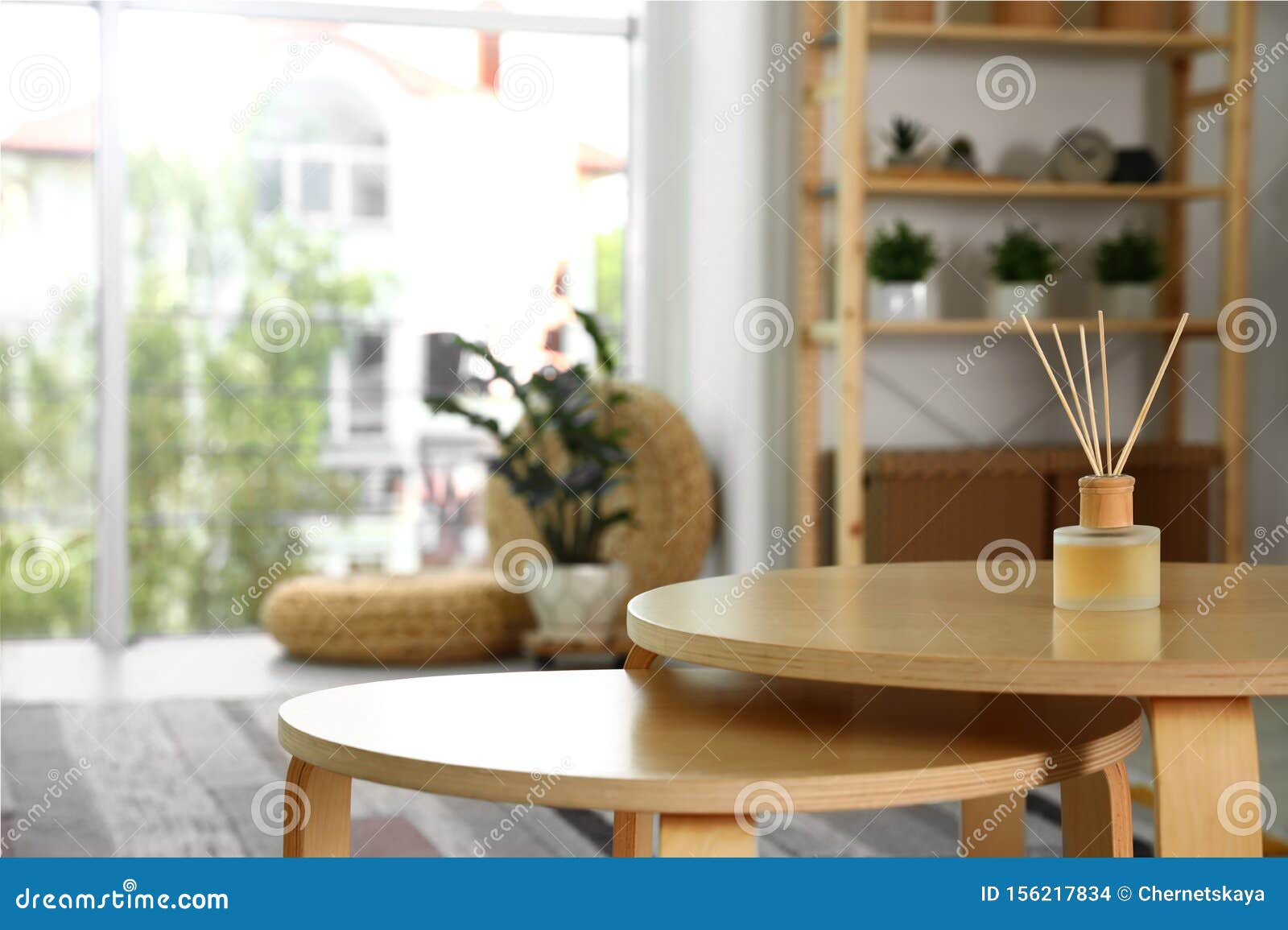 Reed Diffuser on Wooden Table in Modern Room Stock Photo - Image of ...