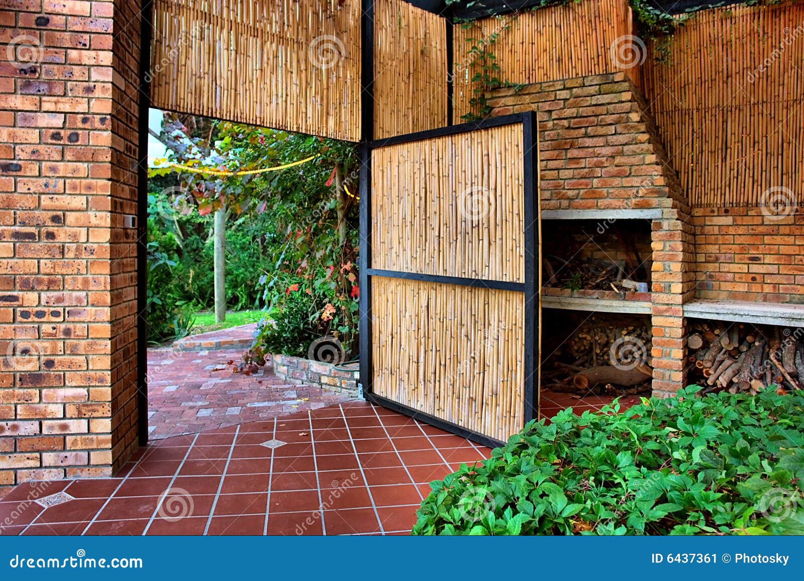 Reed door into garden stock image. Image of flower, cape - 6437361