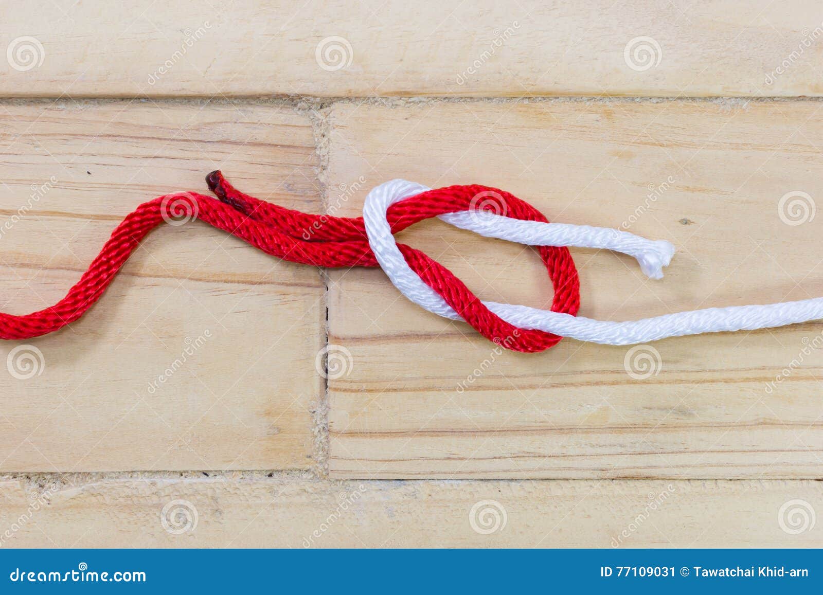 Reef Knot Made with Red Rope on Wooden Background. Stock Image - Image ...