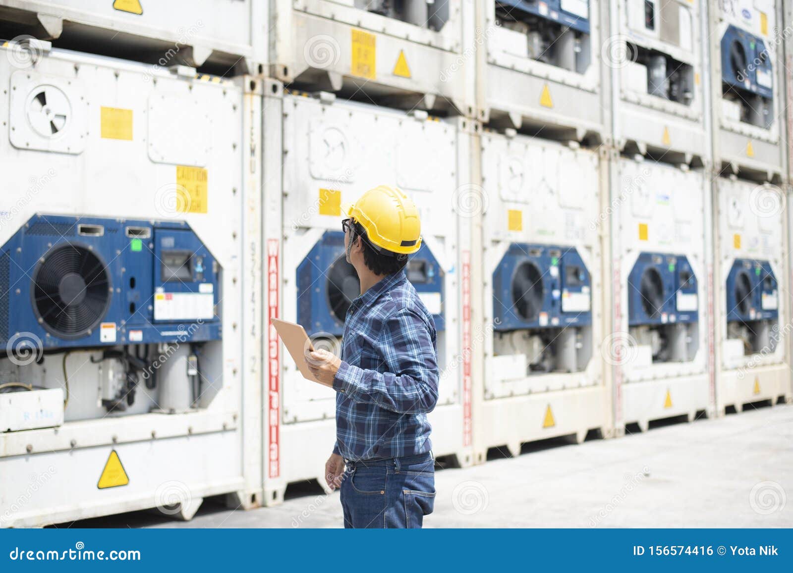 Asian Man Reefer Technician Is Seriously Working And Monitoring Reefer ...