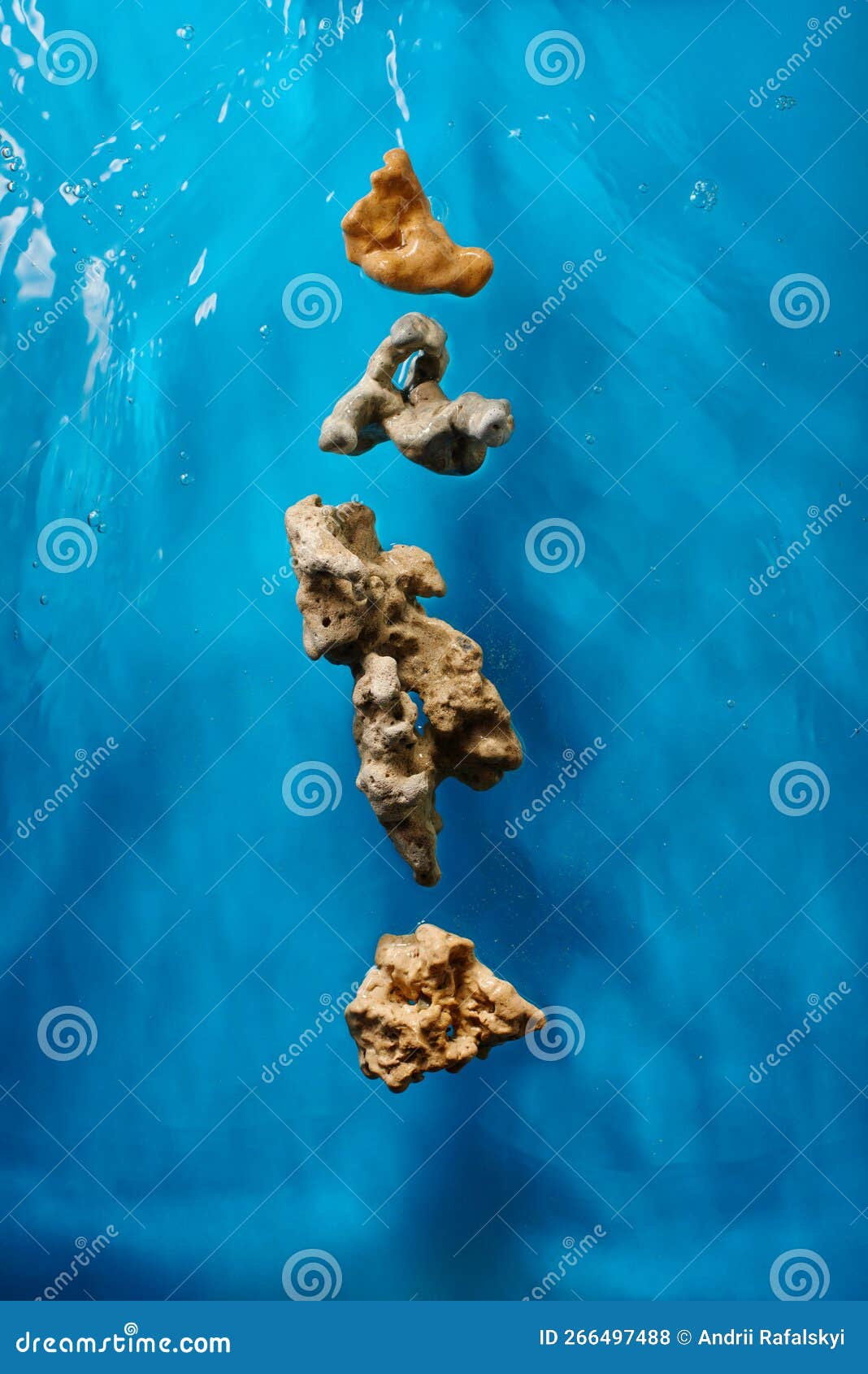 Reefs in Bright Blue Ocean Water with Waves and Bubbles Stock Photo ...