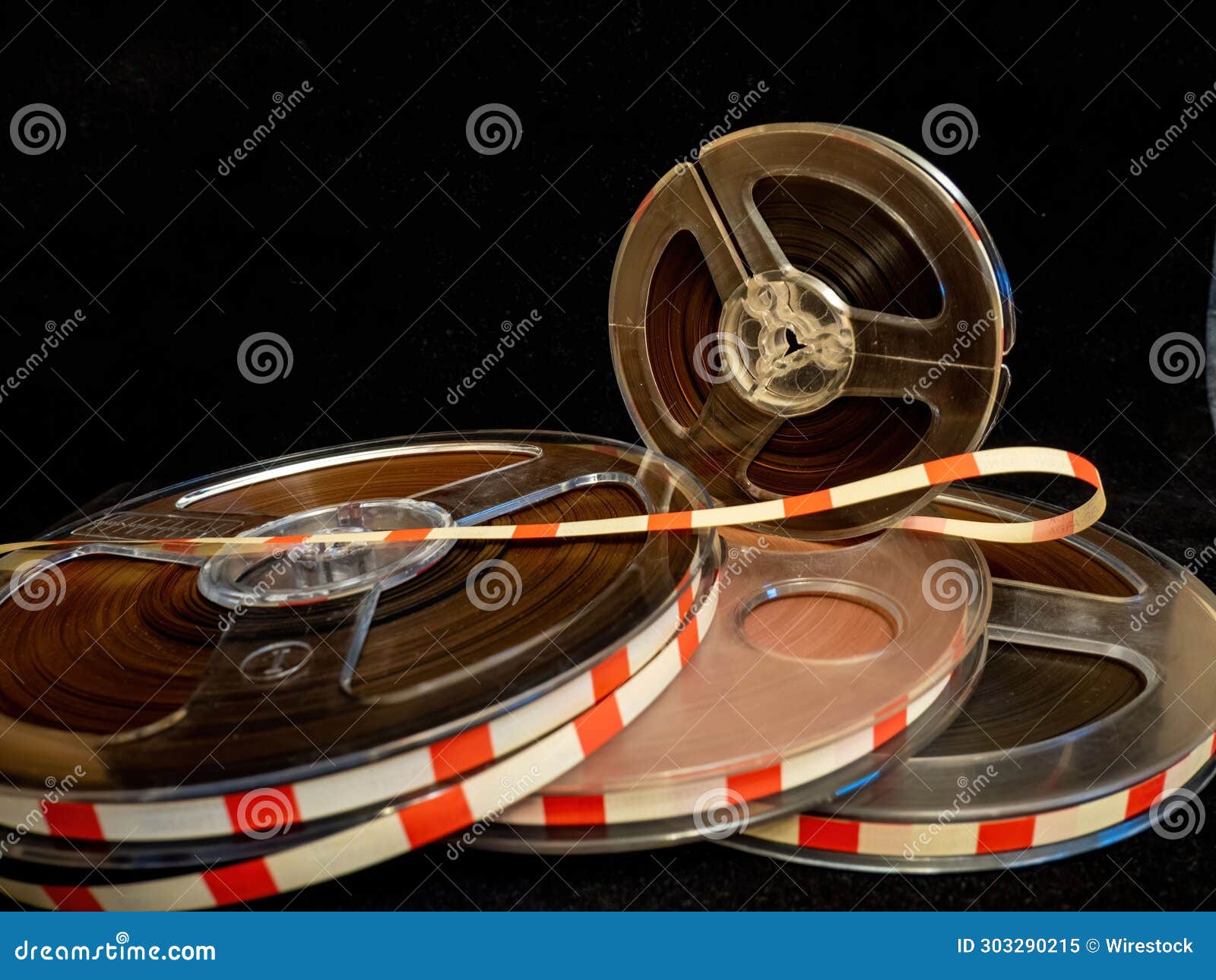 A Reel is Shown with Its Reel End Pulled Up and Some Film are Still on ...