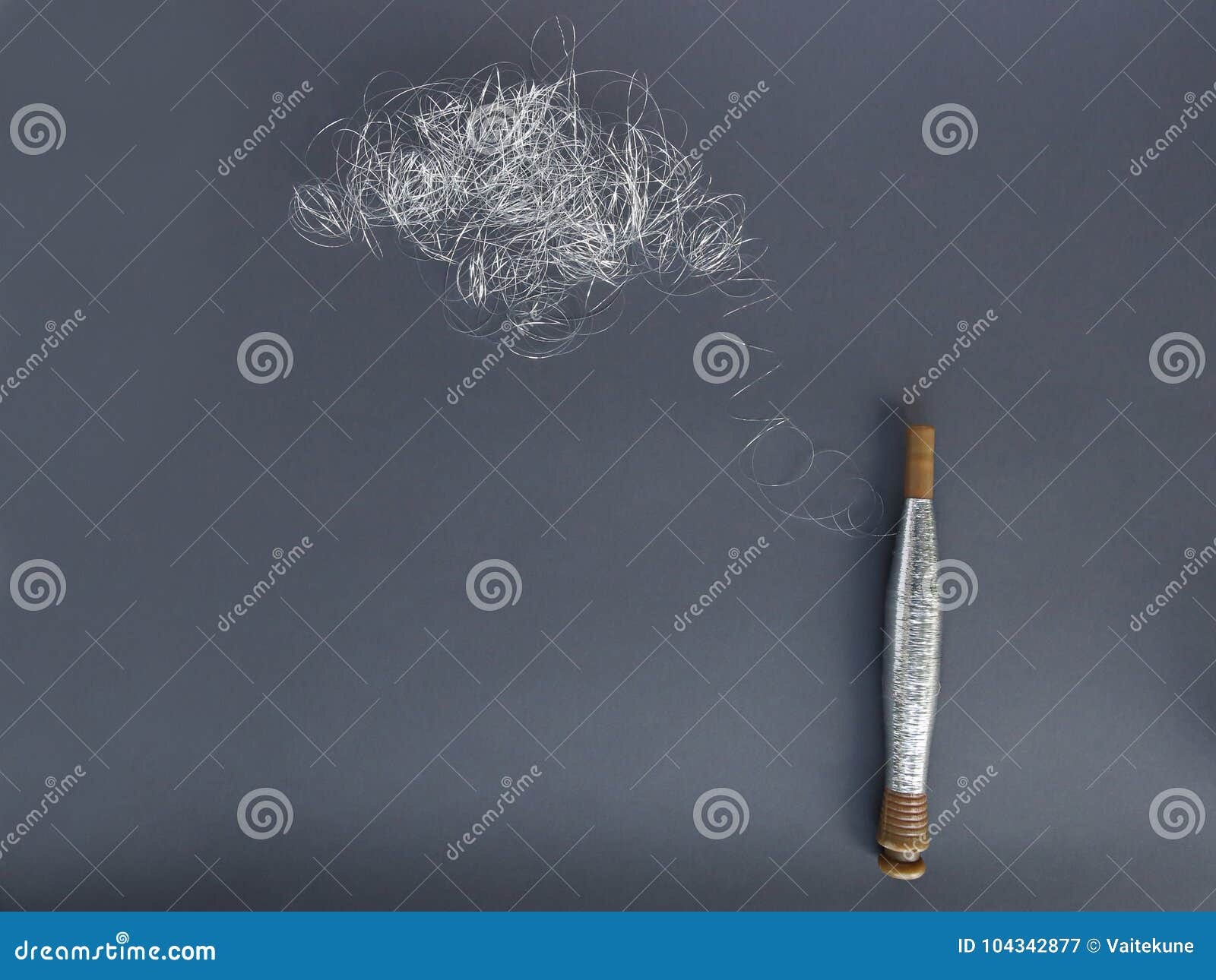 Silver Thread Pile Like Cloud and Spool of Silver Thread. Stock Image ...