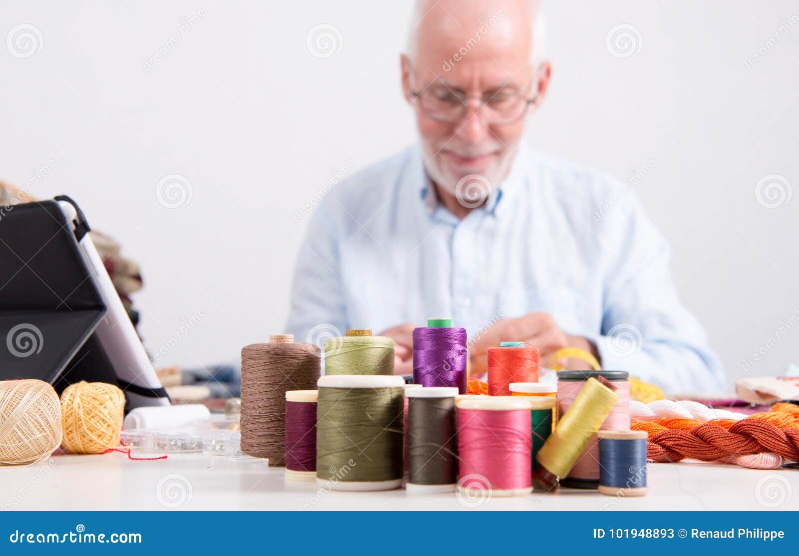 Reels of Colored Threads, Man Tailor at the Bottom Stock Image - Image ...